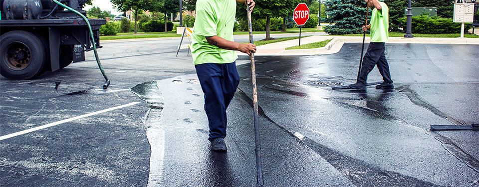 3 Signs Your Parking Lot Needs Asphalt Sealcoating - Maul Paving Inc.
